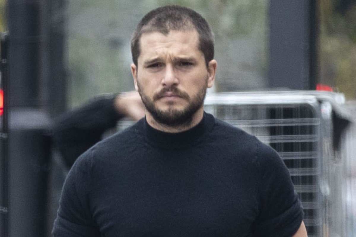 Kit Harington sports new buzz cut while walking dog in London